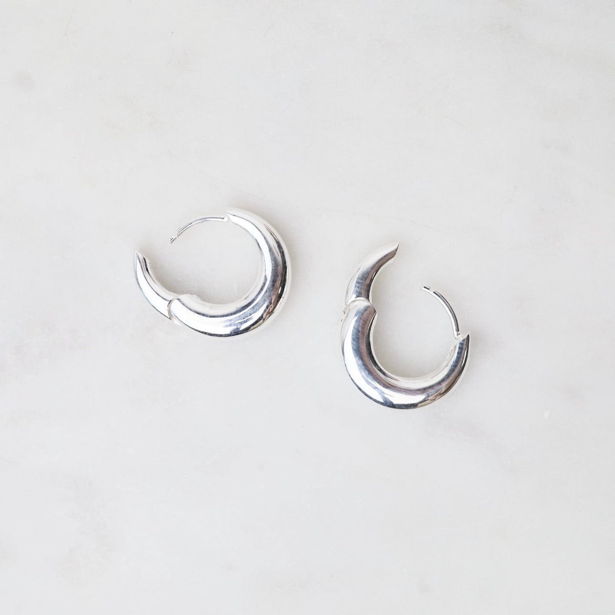 Sterling Silver Medium Crescent Click Huggie Hoops – Dandelion Jewelry