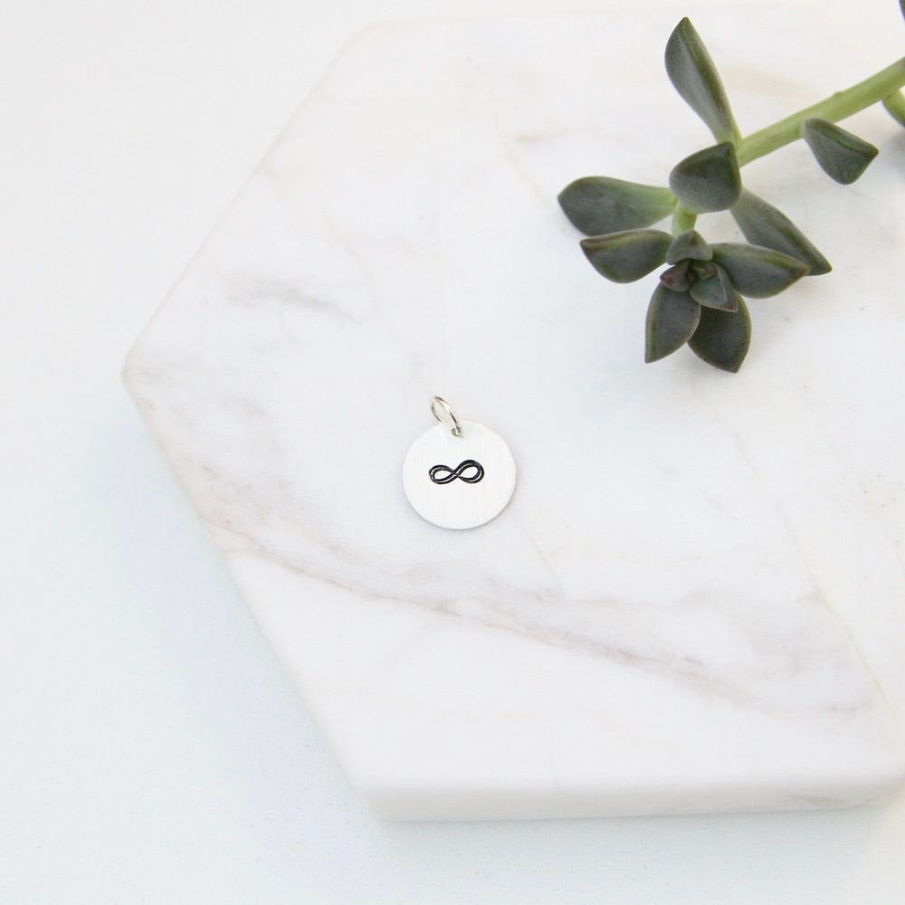 Small Disk With Hand Stamped Infinity Sign – Dandelion Jewelry